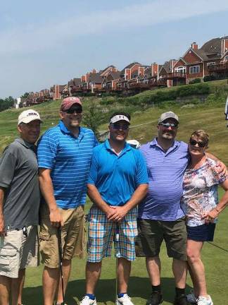 Golf outing raises funds for cancer victim