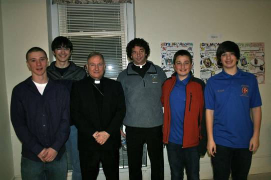 Bishop Serratelli join Squires for pizza