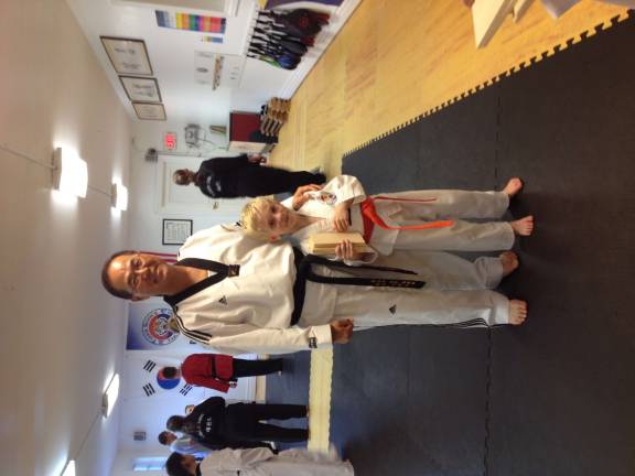 Tiger Shin's student receives orange belt
