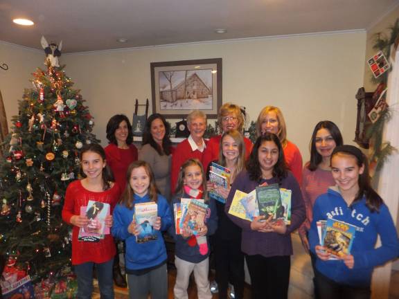 Sparta volunteers donate books for families at Newton Medical Center