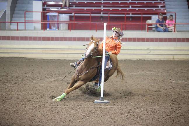 Local teen is barrel racing and pole bending across the country